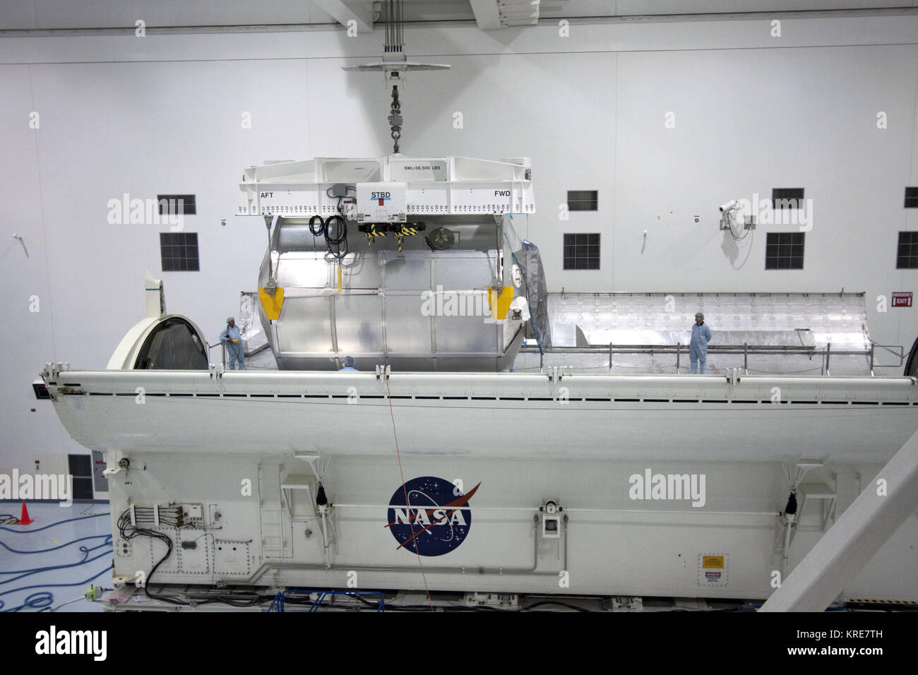 STS-135 MPLM Raffaello is lowered into a payload canister Stock Photo ...