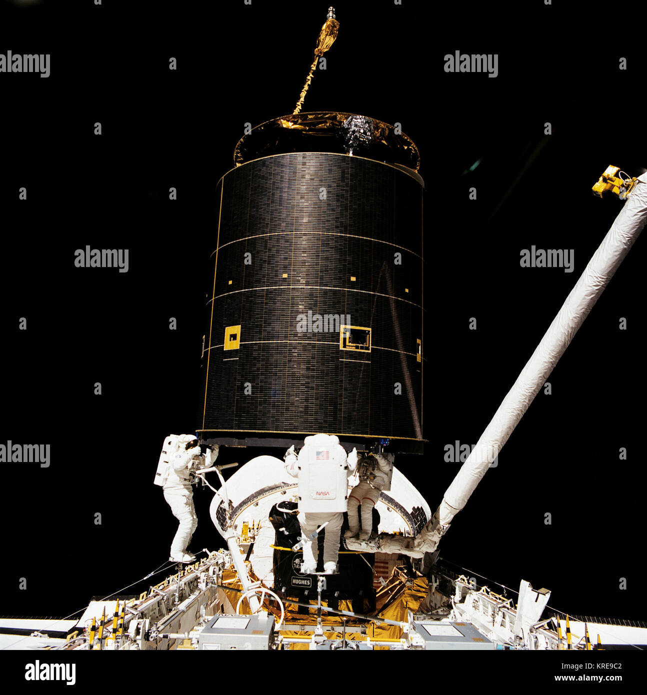 Three Crew Members Capture Intelsat VI - GPN-2000-001035 Stock Photo ...