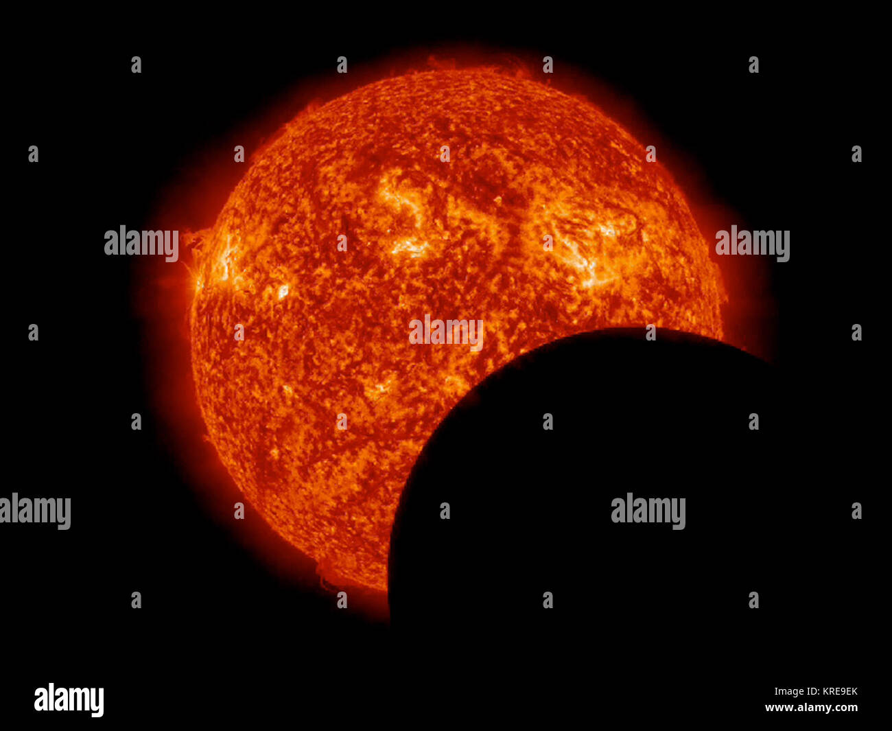 The moon crossing in front of the sun Stock Photo - Alamy