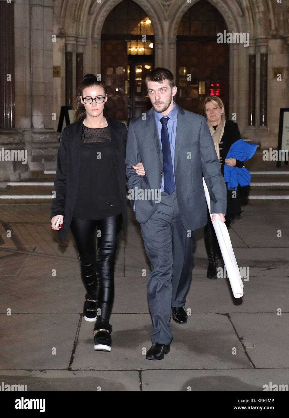 Tom and Kate Evans leave the High Court in London as a High Court judge ...