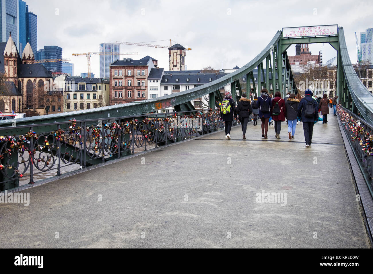 Frankfurt, Germany.Young people walk on Eiserner Steg,Iron footbridge ...