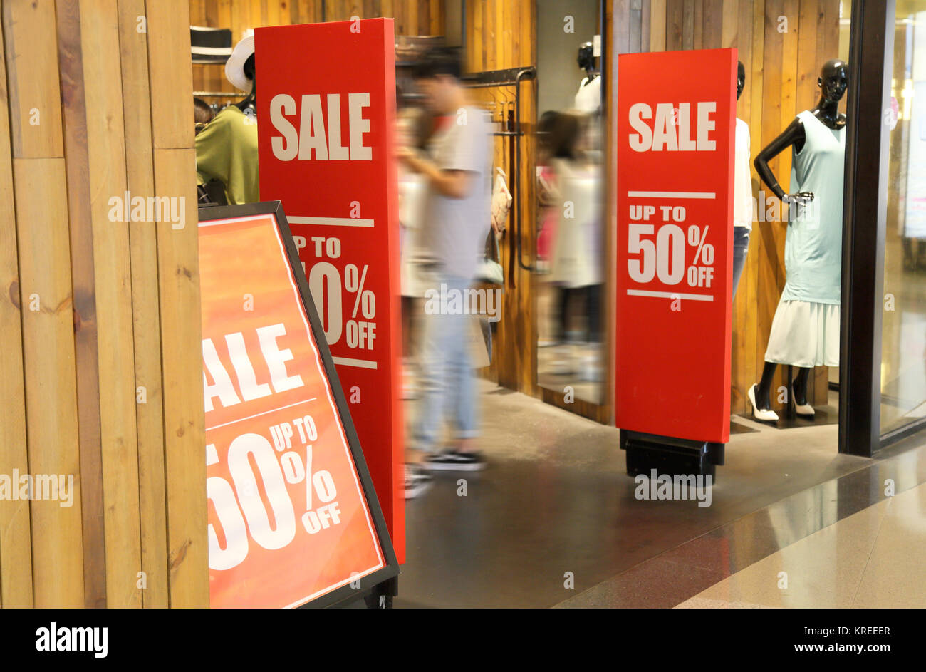 sale sign on shop display Stock Photo - Alamy