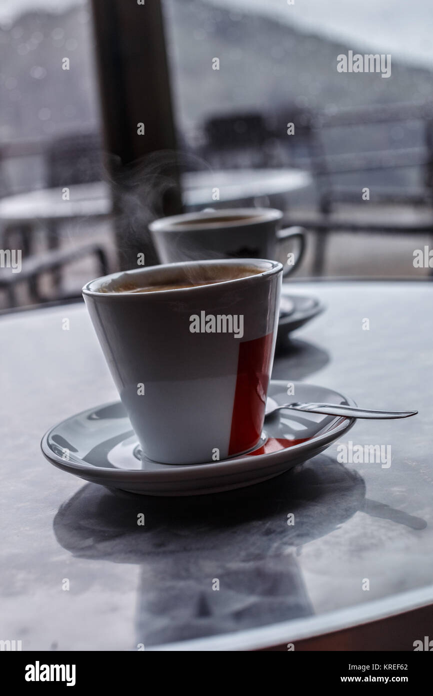 Two cups of coffee on a table Stock Photo - Alamy