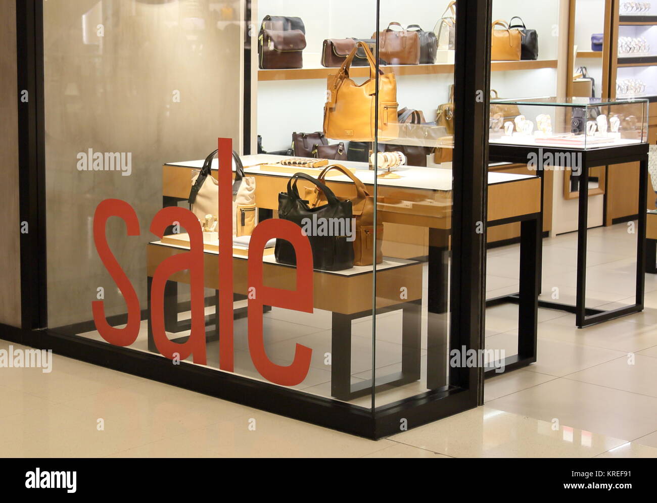sale sign on shop display Stock Photo - Alamy