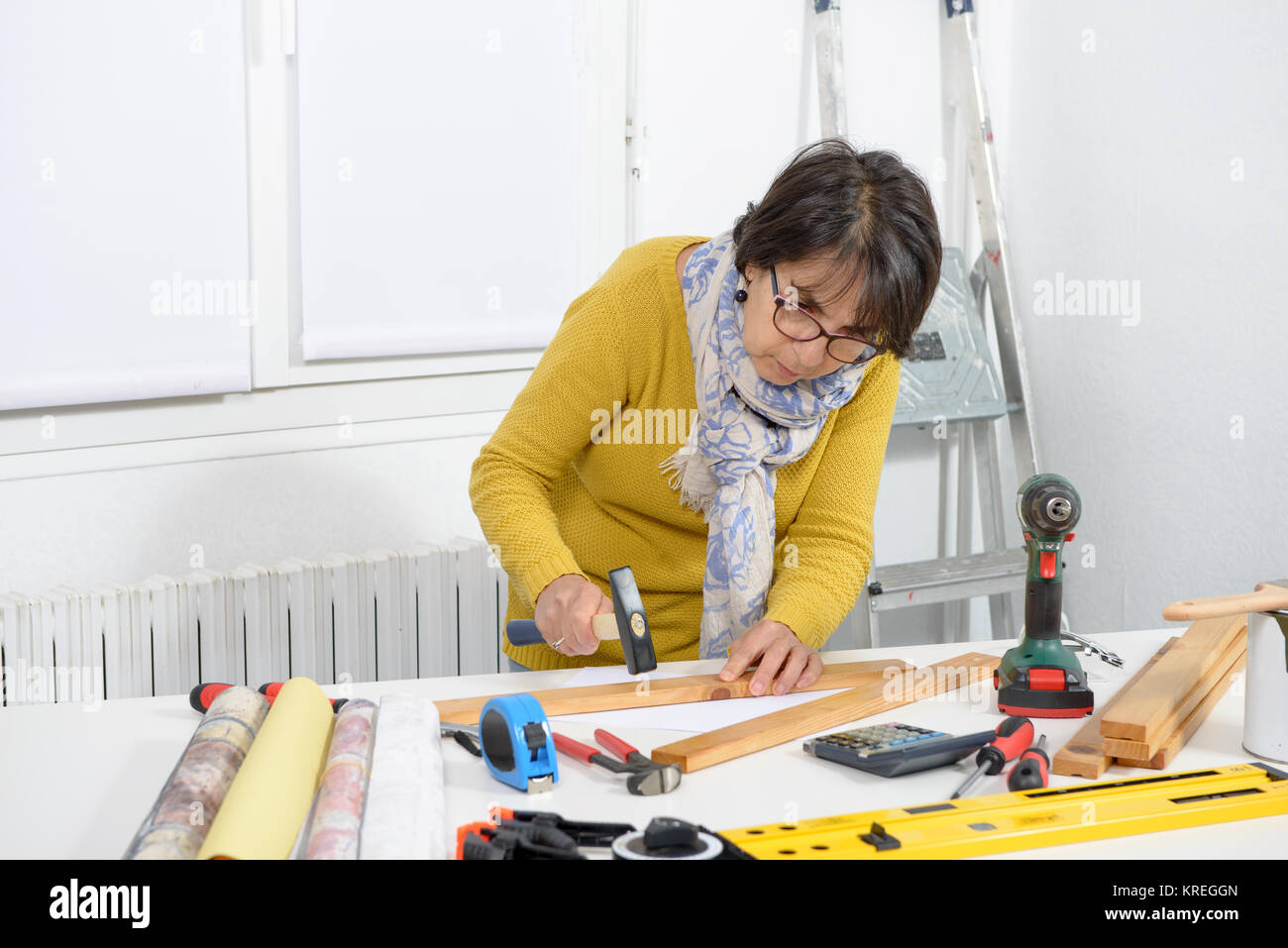 Mature woman doing diy hi-res stock photography and images - Alamy