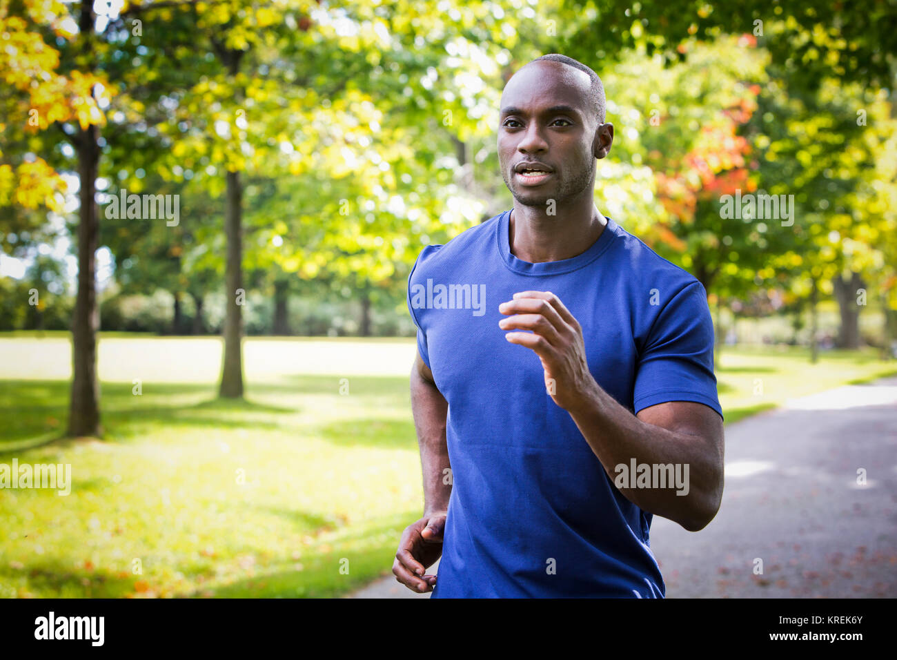 young man running outdoors Stock Photo - Alamy