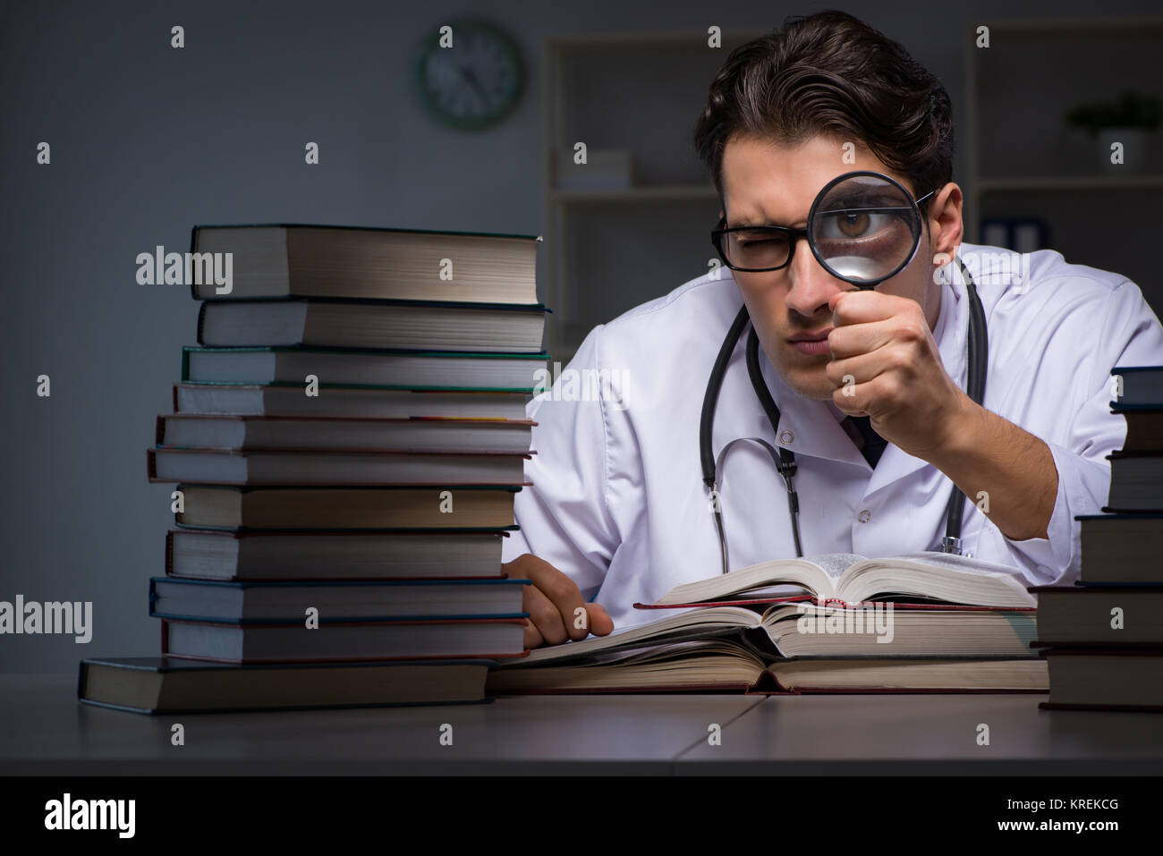 Medical student preparing for university exams at night Stock Photo - Alamy