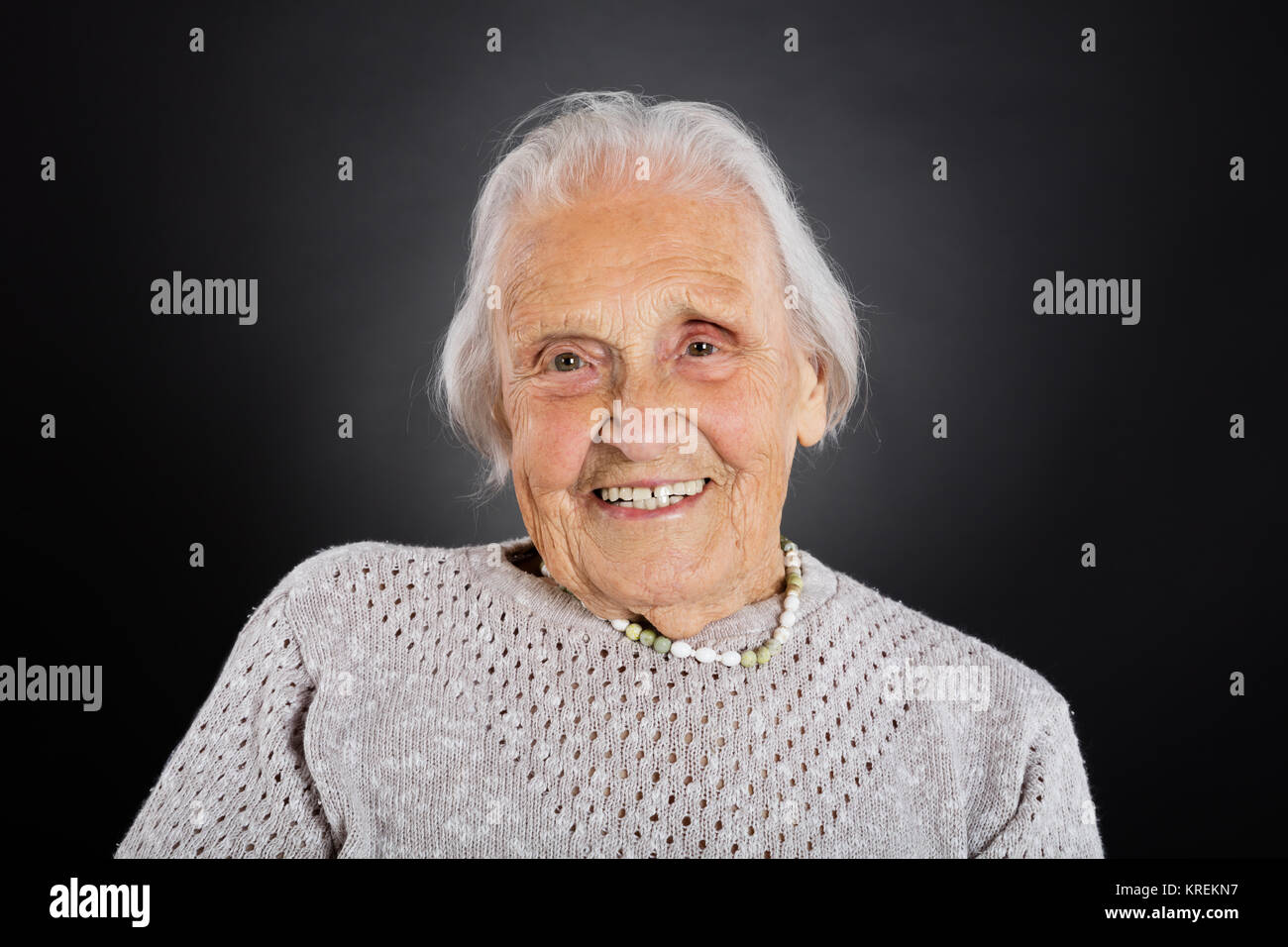 Portrait Of A Smiling Old Woman Stock Photo - Alamy