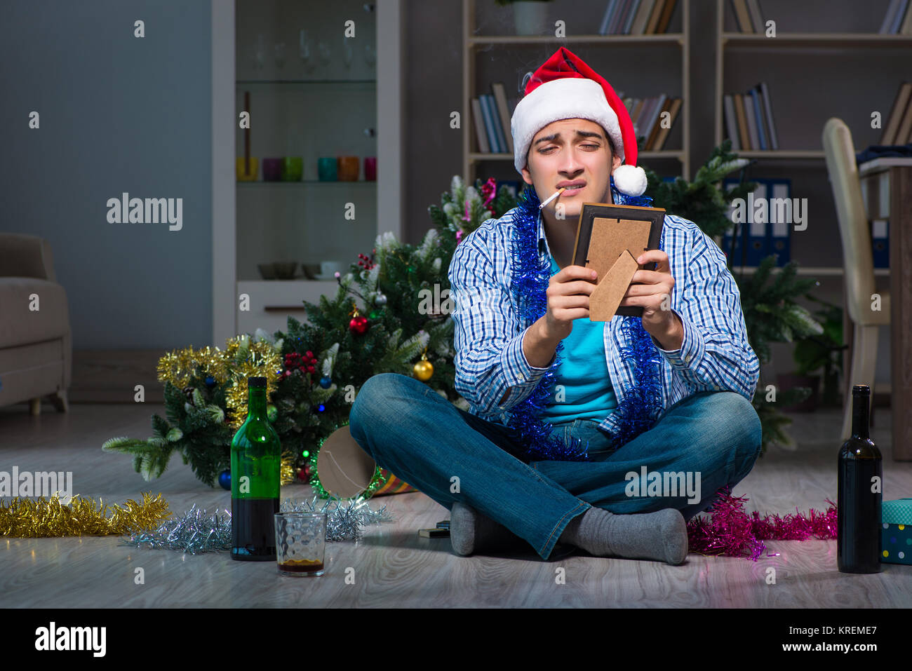 Man celebrating christmas at home alone Stock Photo - Alamy