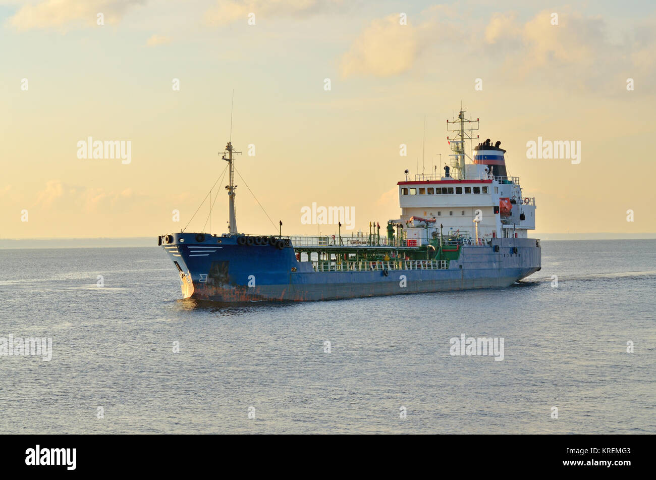 On the horizon the sea is visible floating tanker Stock Photo - Alamy