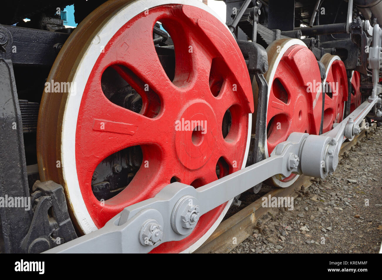 The iron wheels of the train.Painted in red color Stock Photo - Alamy