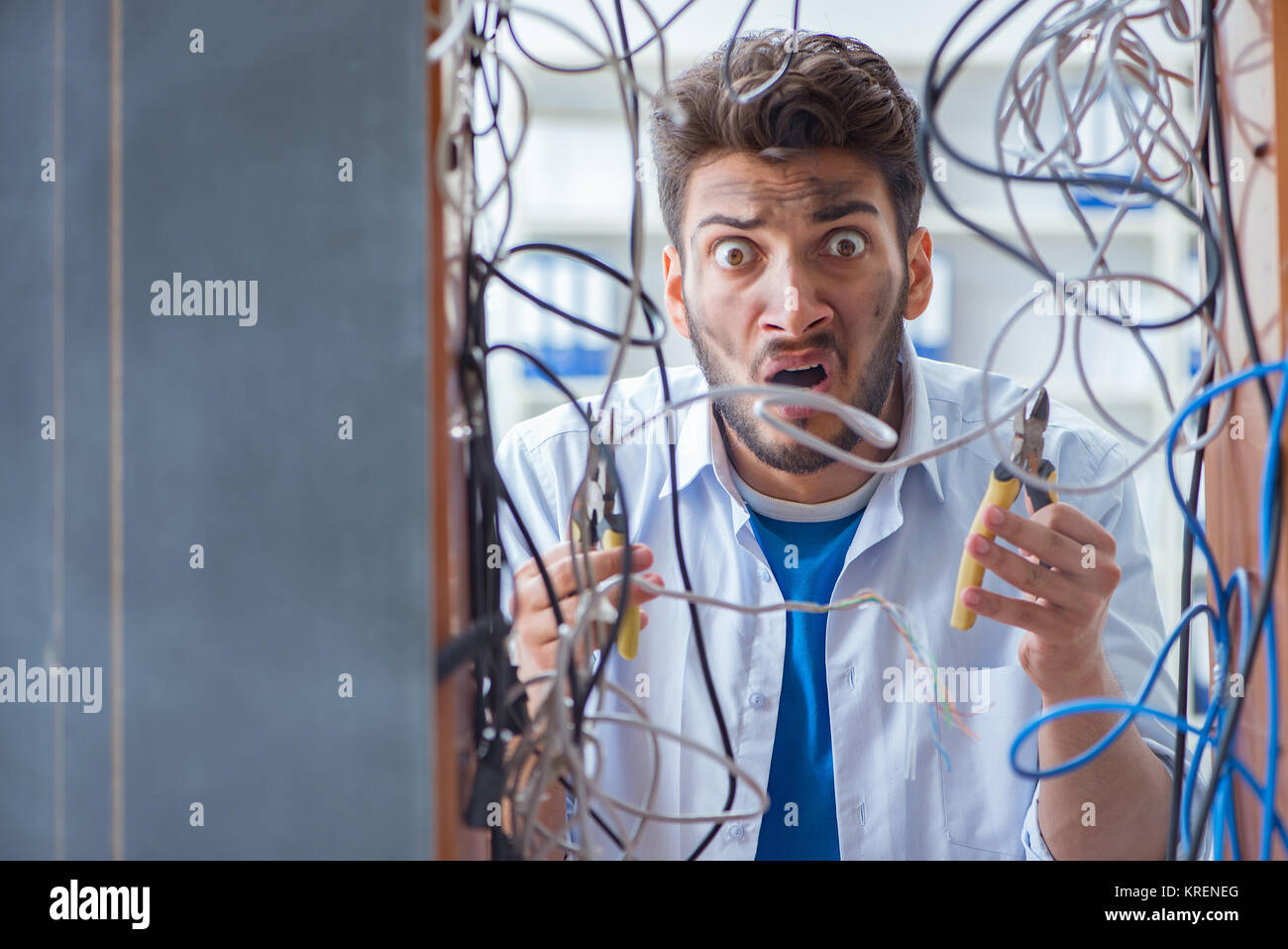 Computer repairman working on repairing network in IT workshop Stock ...