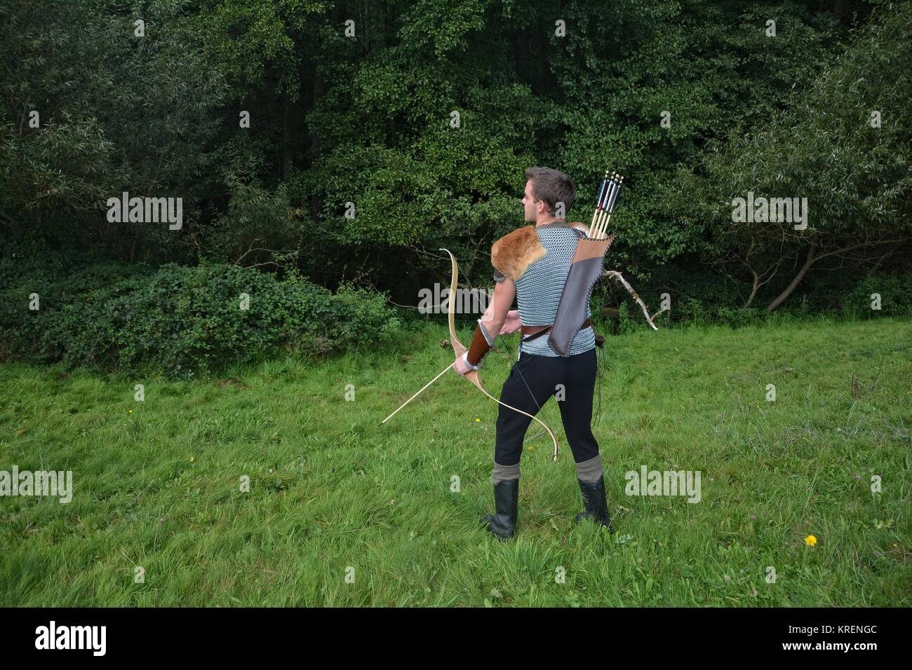 Â Â Â Â young medieval archer with chain mail,bow and arrow in nature ...