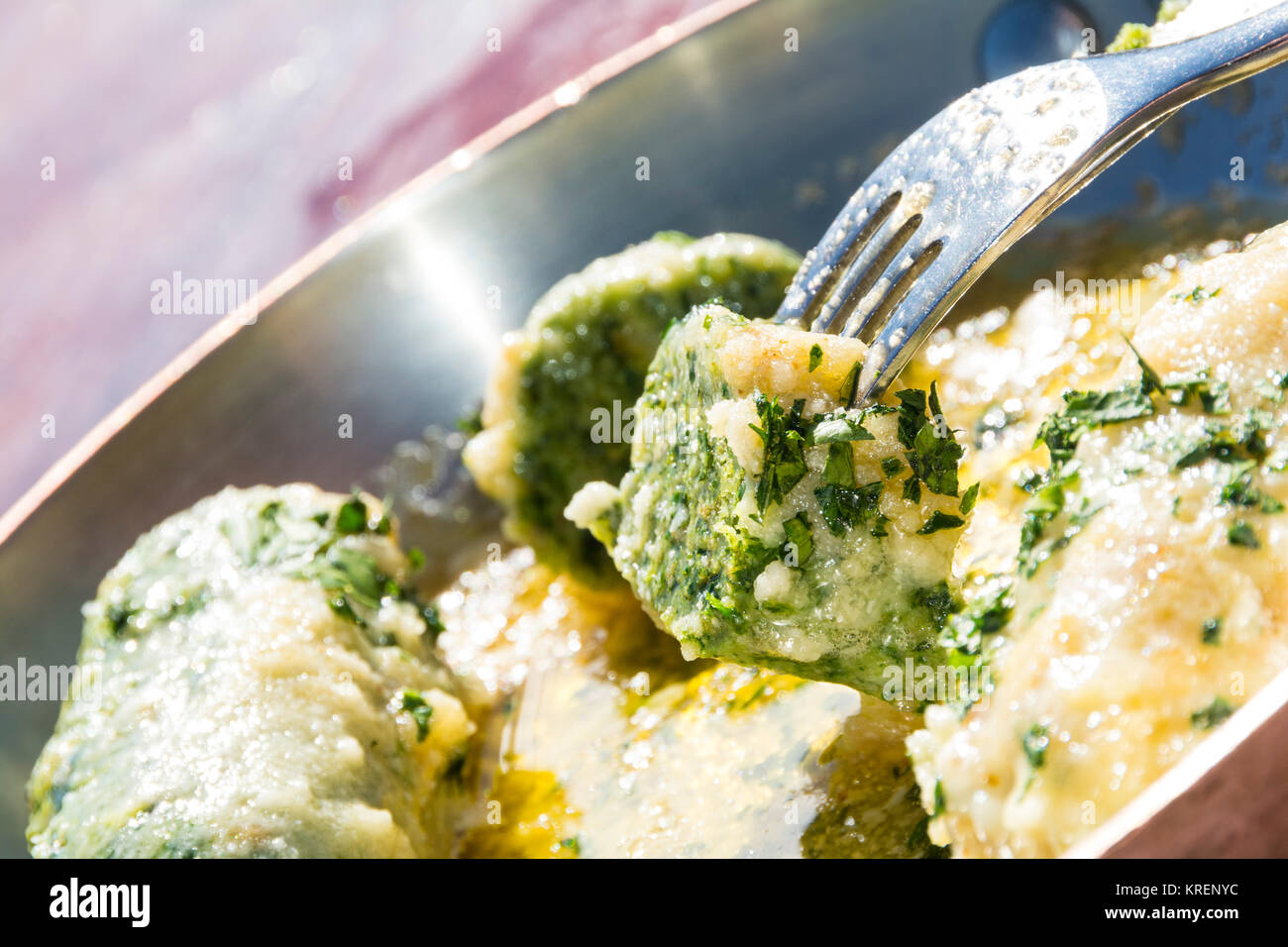 lunch at the alpine hut - spinach cakes and cheese socks Stock Photo ...