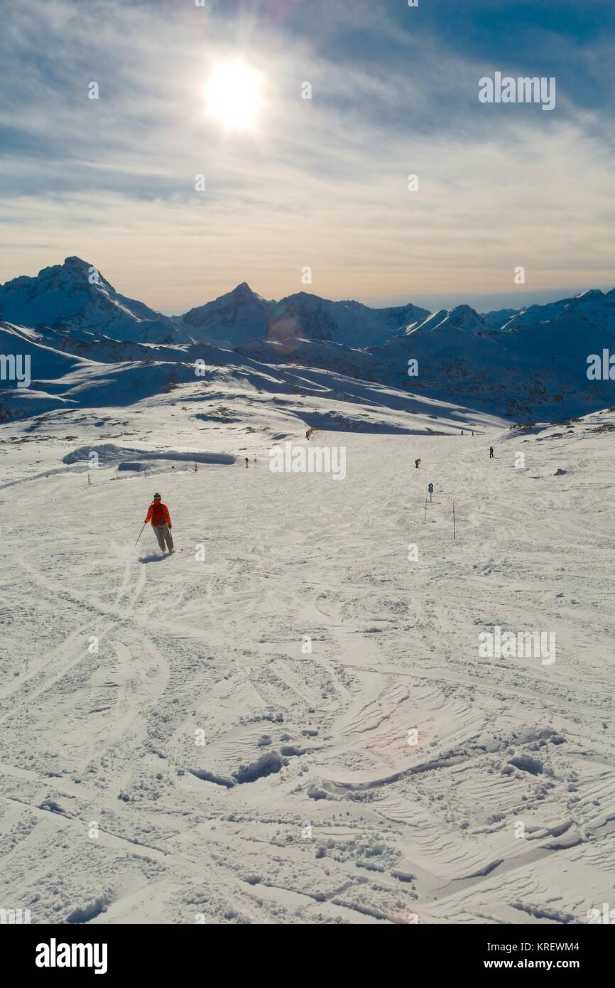 Skiing on alpine slopes Stock Photo - Alamy
