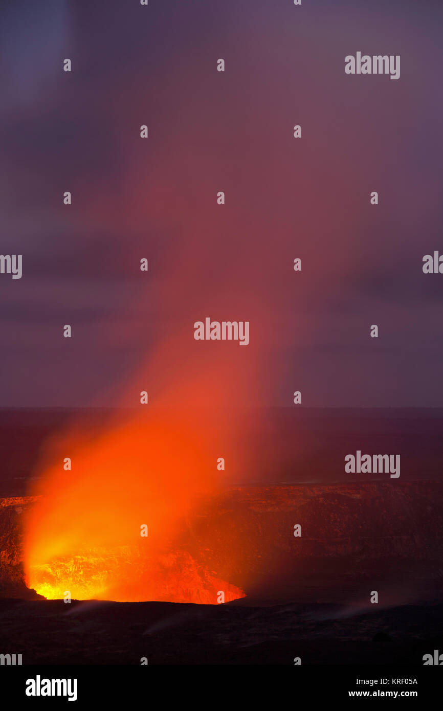 The Kilauea Volcano eruption glows during the blue hour between ...