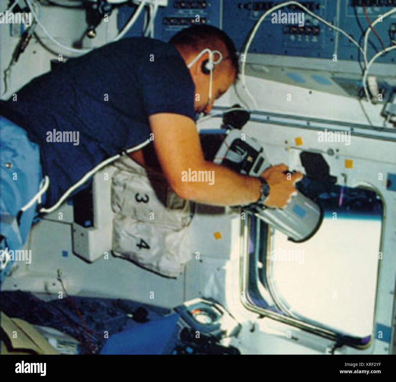 STS-51-B Overmyer with camera Stock Photo - Alamy