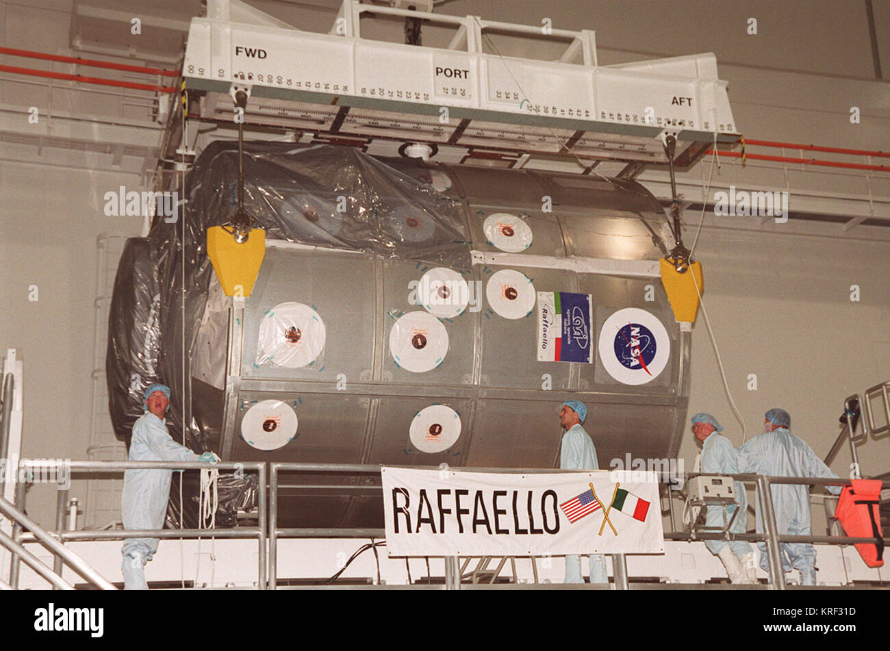 STS-100 MPLM Raffaello is moved to the payload canister Stock Photo - Alamy