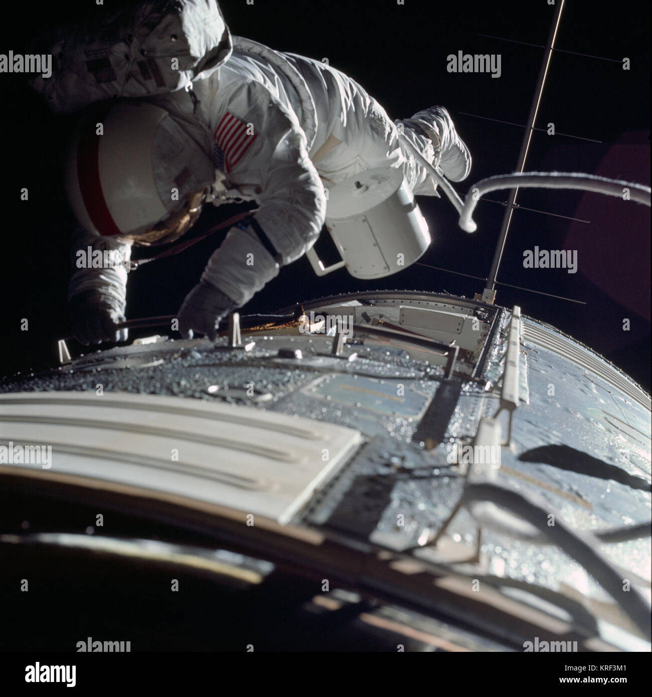 Apollo 17 astronaut Ronald E. Evans performs an EVA to retrieve film ...