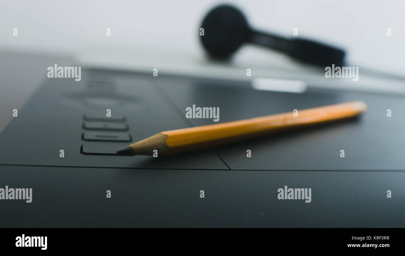 Old Pencil and new wacom intuos pro Stock Photo - Alamy
