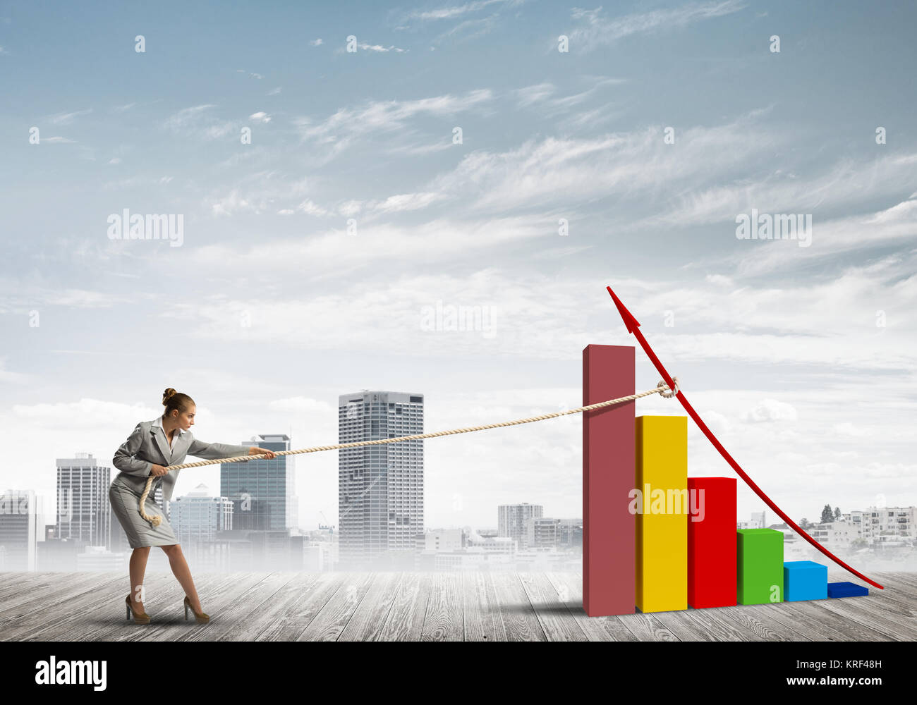 Businesswoman pulling graph with rope as concept of power and control ...