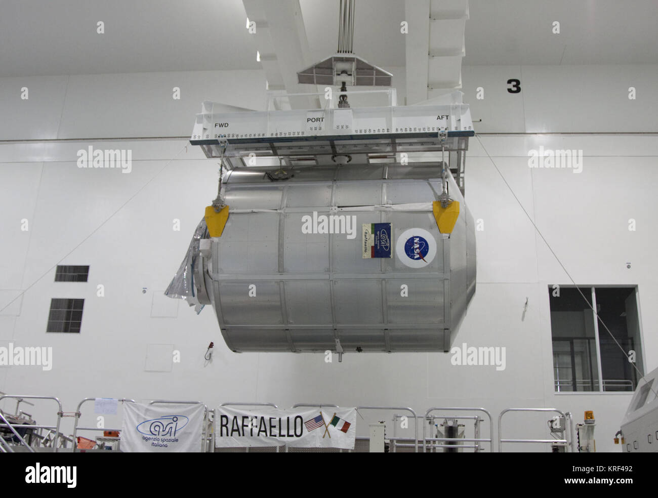 STS-135 MPLM Raffaello is lifted with an overhead crane Stock Photo - Alamy