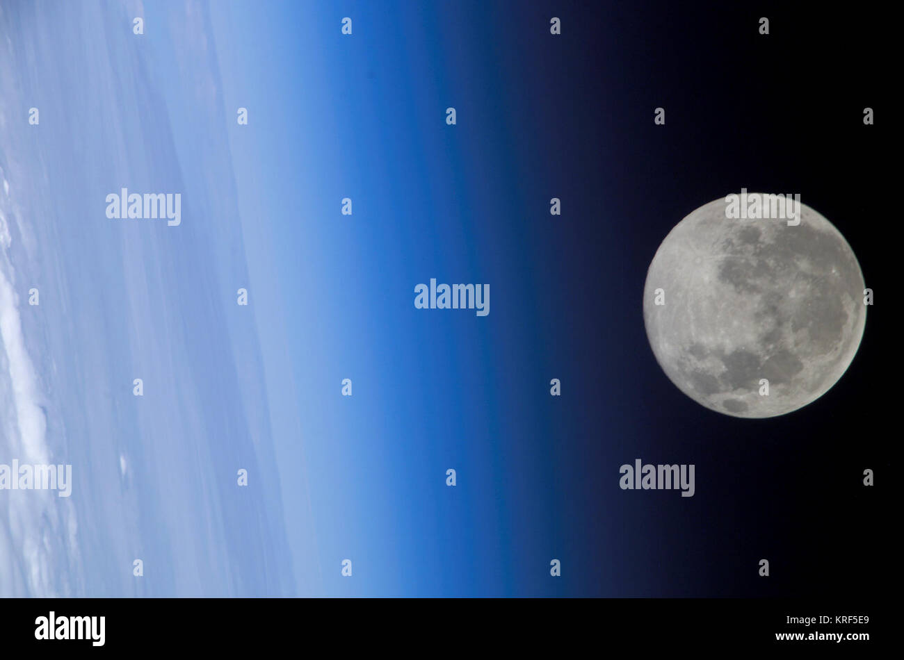 Moon on earth horizon Stock Photo - Alamy