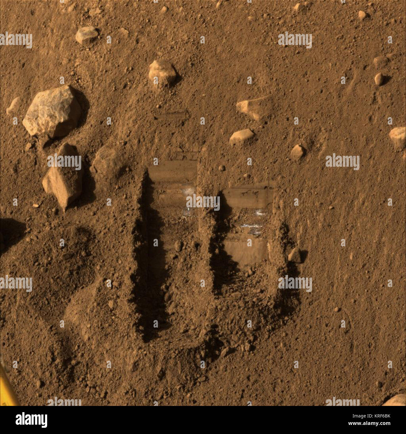 Spacecraft Rover Picking Up Soil