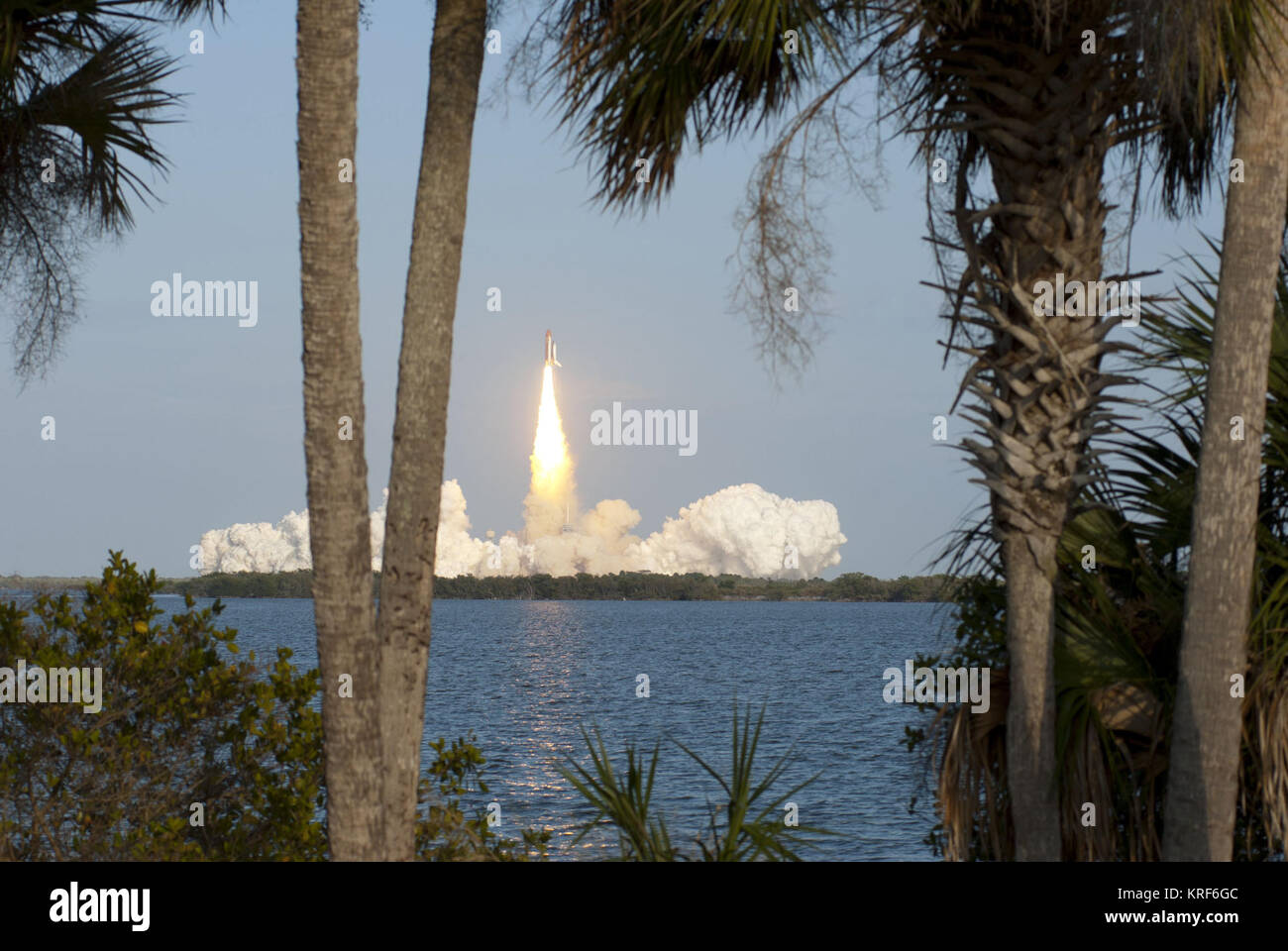 Atop a tower of smoke and fire, Space Shuttle Discovery heads for the ...