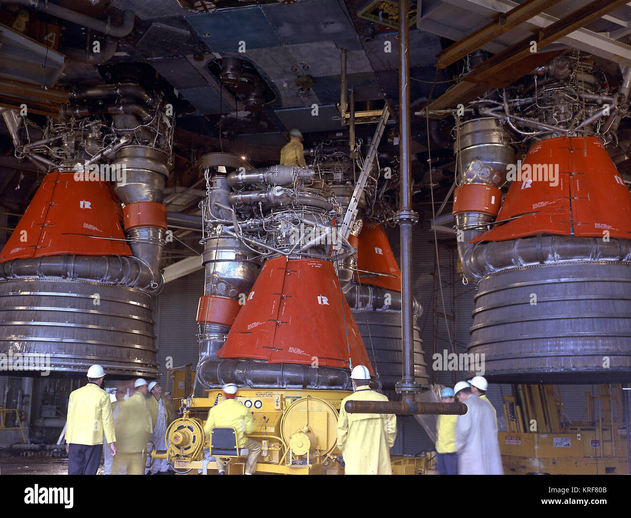 Installation of F-1 engines IN S-IC test stand. view showing engines in ...