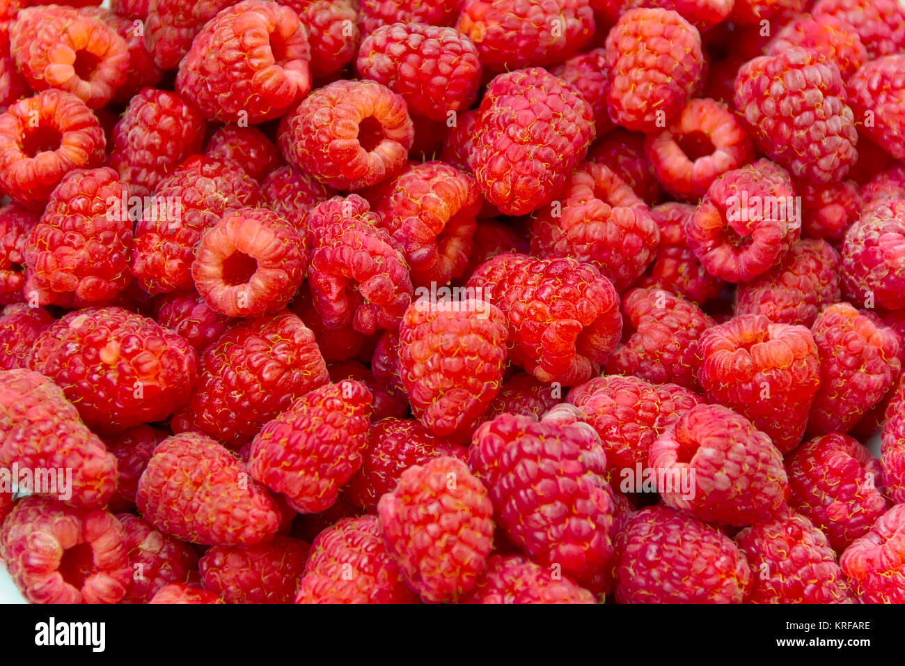 Photo of the background fresh red raspberry Stock Photo - Alamy