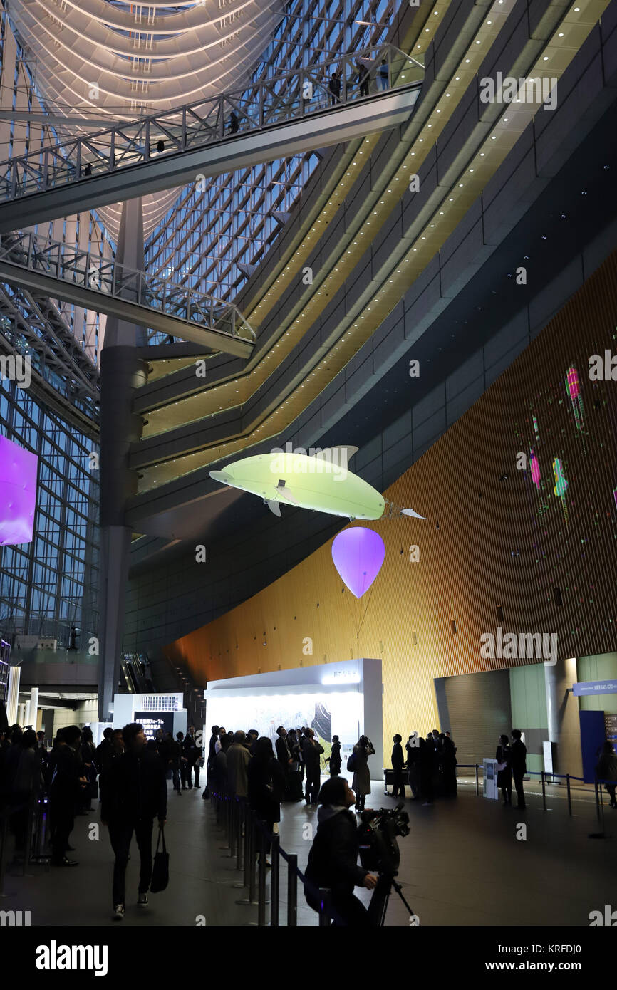 Tokyo, Japan. 19th Dec, 2017. A six-meter long dolphin balloon swims in ...