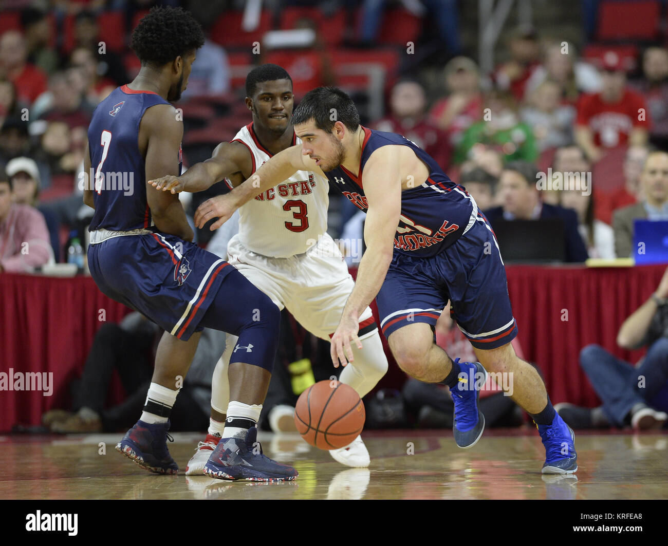 Raleigh, North Carolina, USA. 19th Dec, 2017. MATTY MCCONNELL, right ...