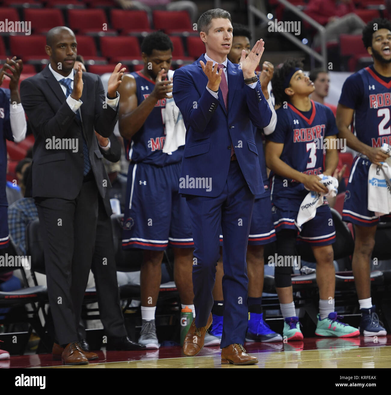 Raleigh, North Carolina, USA. 19th Dec, 2017. ANDREW TOOLE, center ...