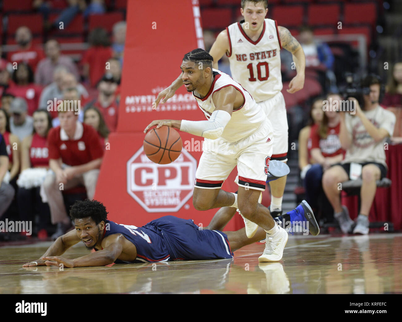 Raleigh, North Carolina, USA. 19th Dec, 2017. ALLERIK FREEMAN, center ...