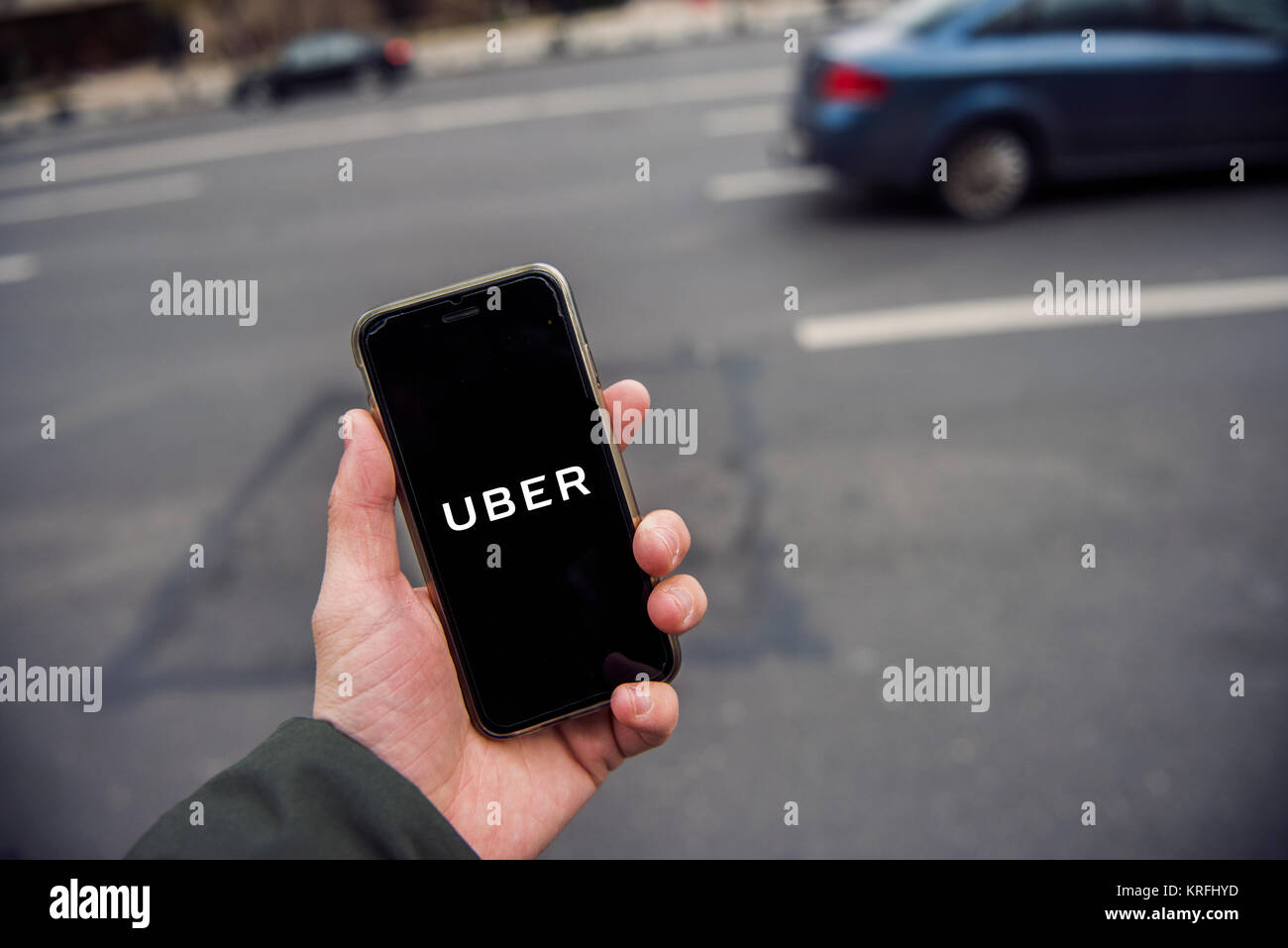 Bucharest, Romania - December 20, 2017: Man holding a smart phone with ...