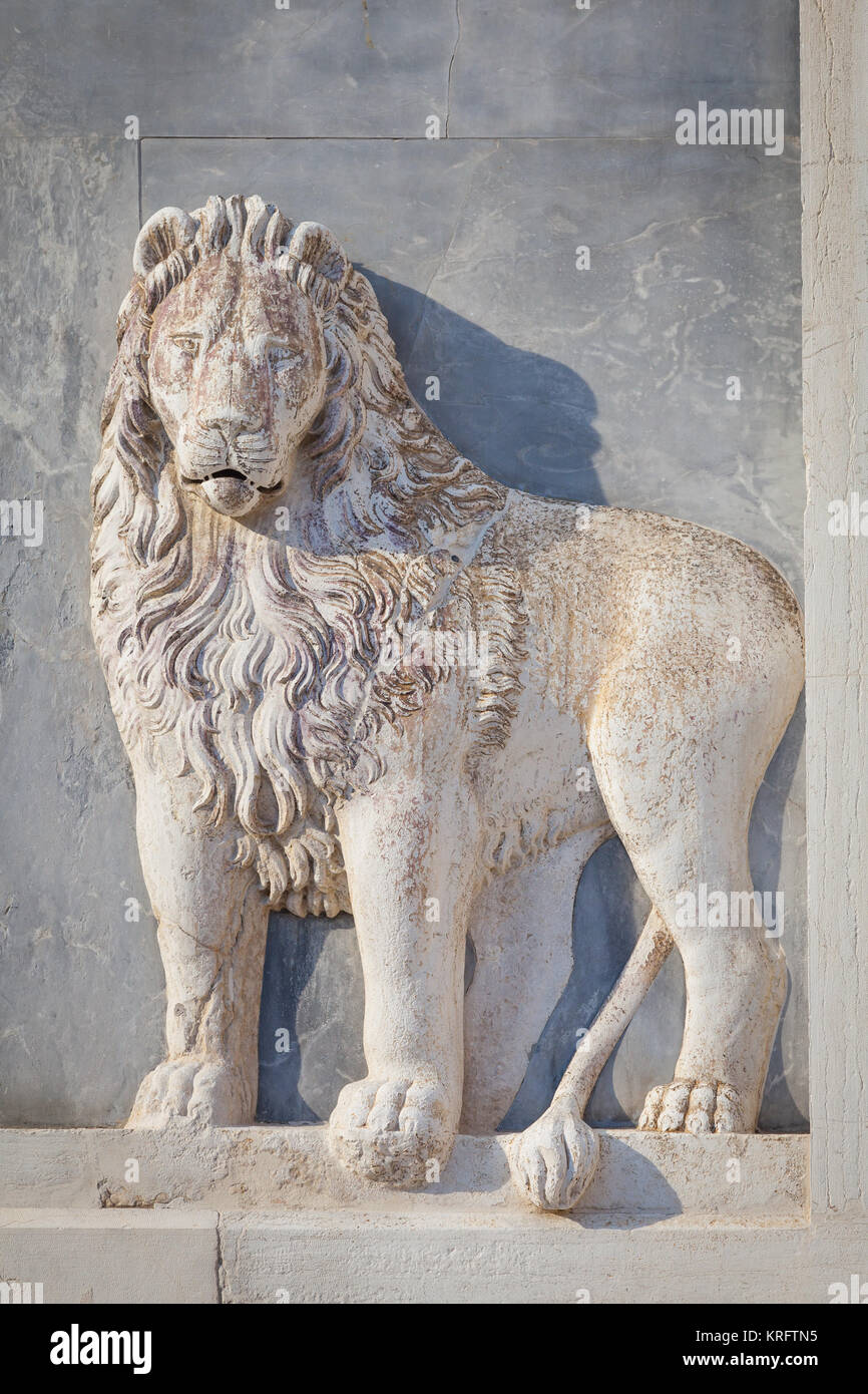 Marble lion on church facade Stock Photo - Alamy
