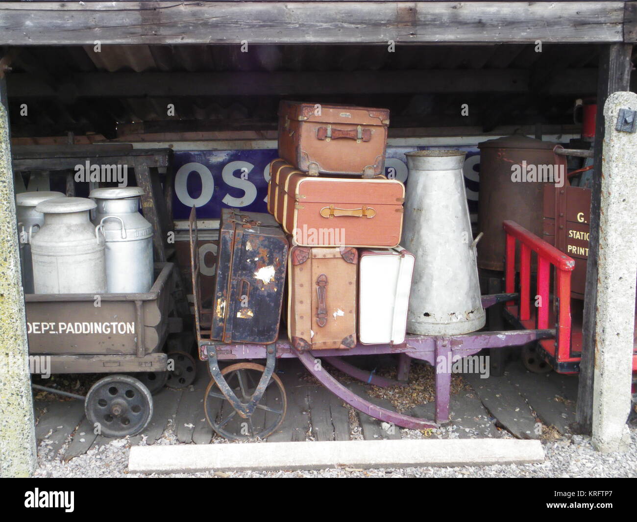 Old suitcases and milk churns on Victorian trolleys at the Didcot ...