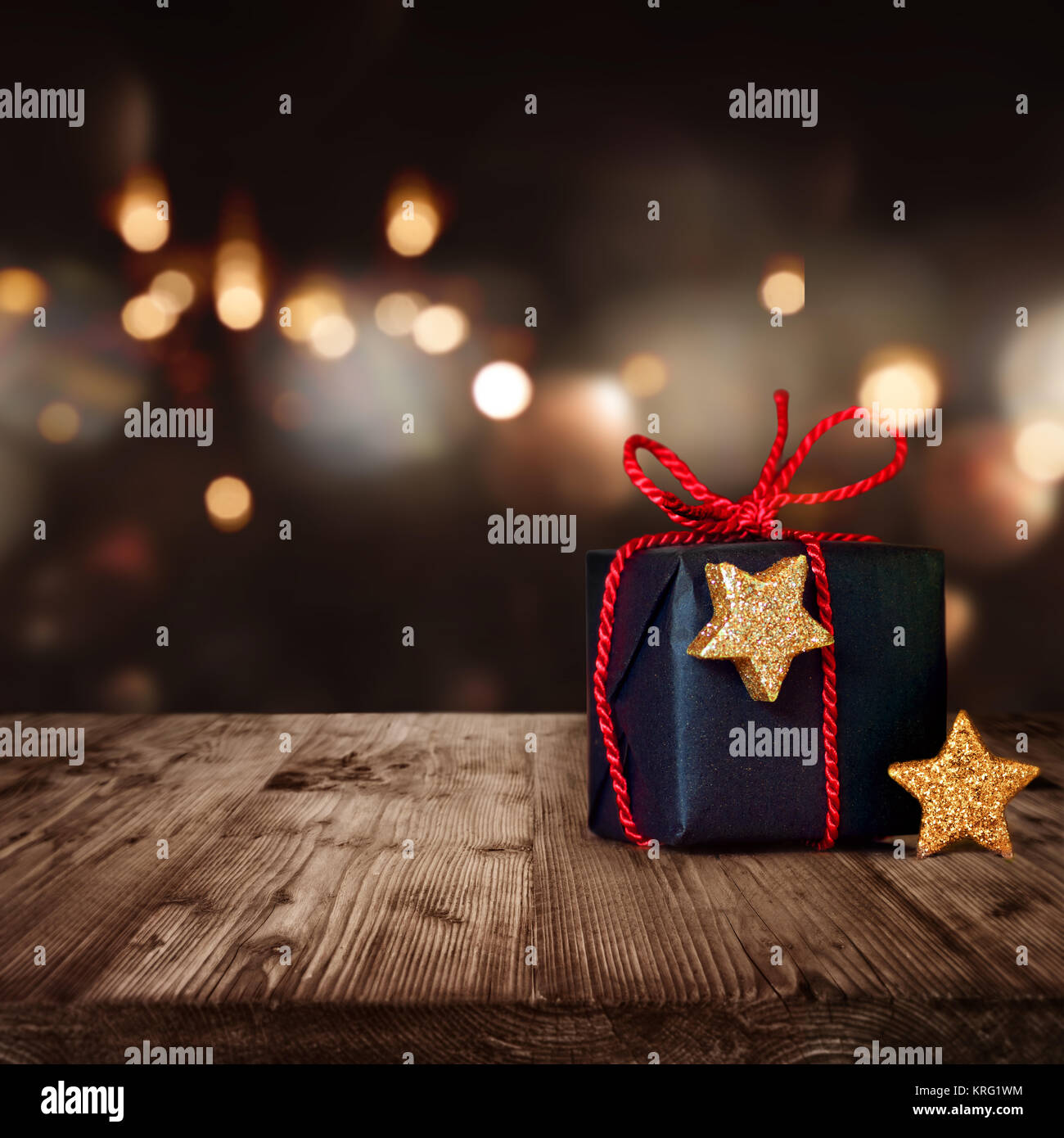 christmas package with festive background Stock Photo - Alamy