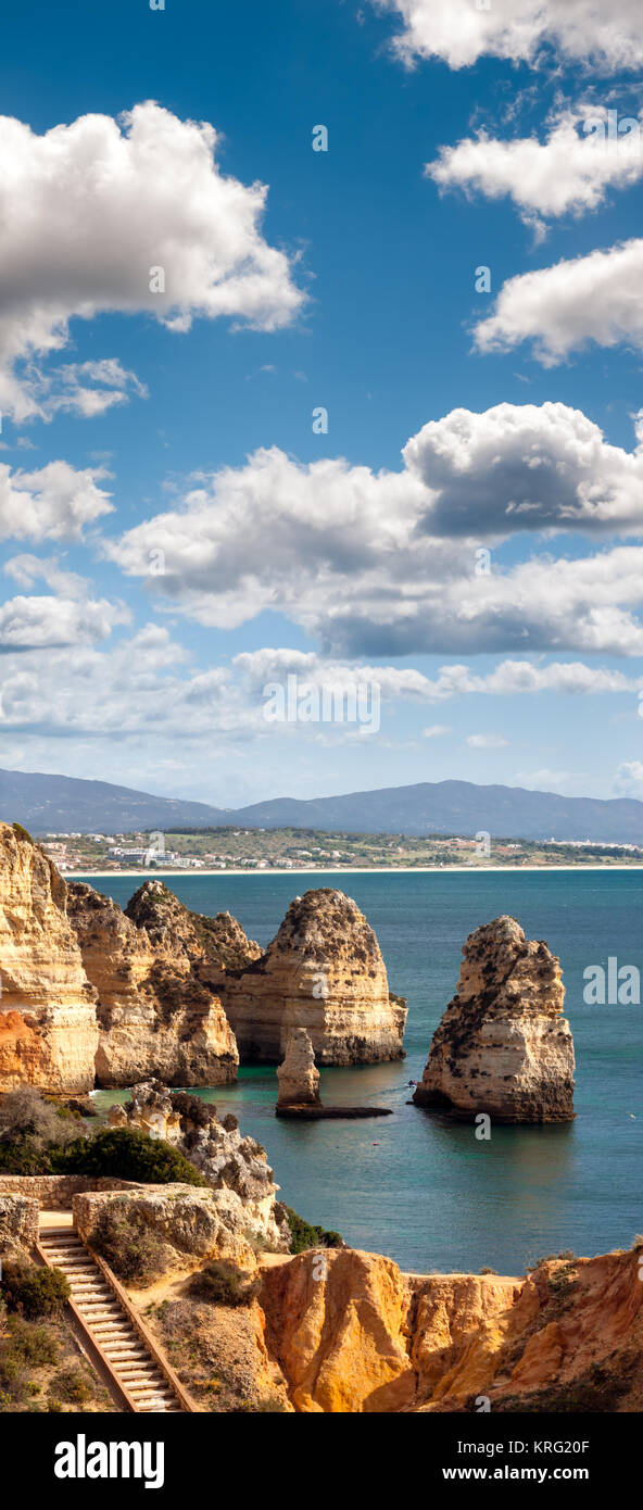 Portugal, Lagos cliffs under cloudy sky Stock Photo - Alamy