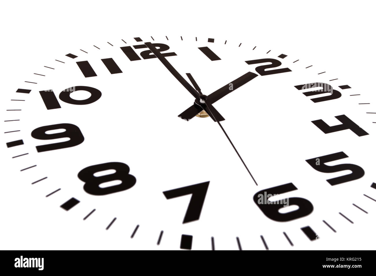 Clock isolated on white marking the two o'clock hour. The main focus is ...