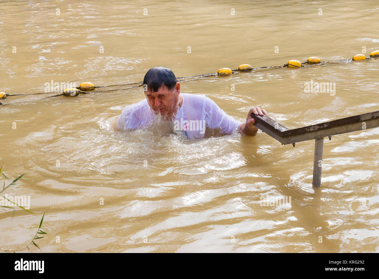 BETHABARA, ISRAEL- 25 NOVEMBER 2017: Pilgrims from different countries ...