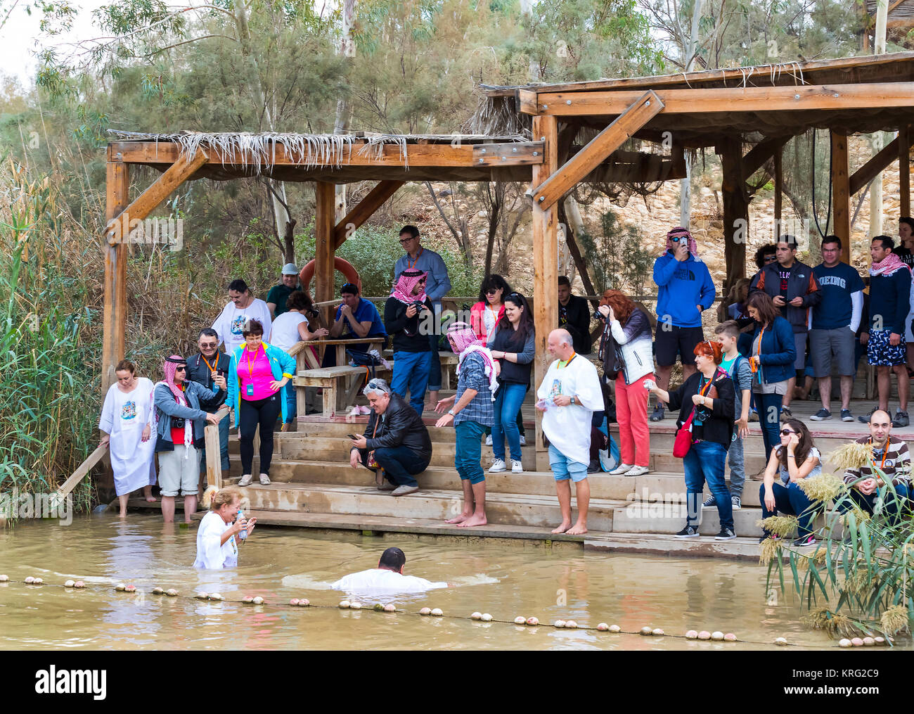 BETHABARA, ISRAEL- 25 NOVEMBER 2017: Pilgrims from different countries ...