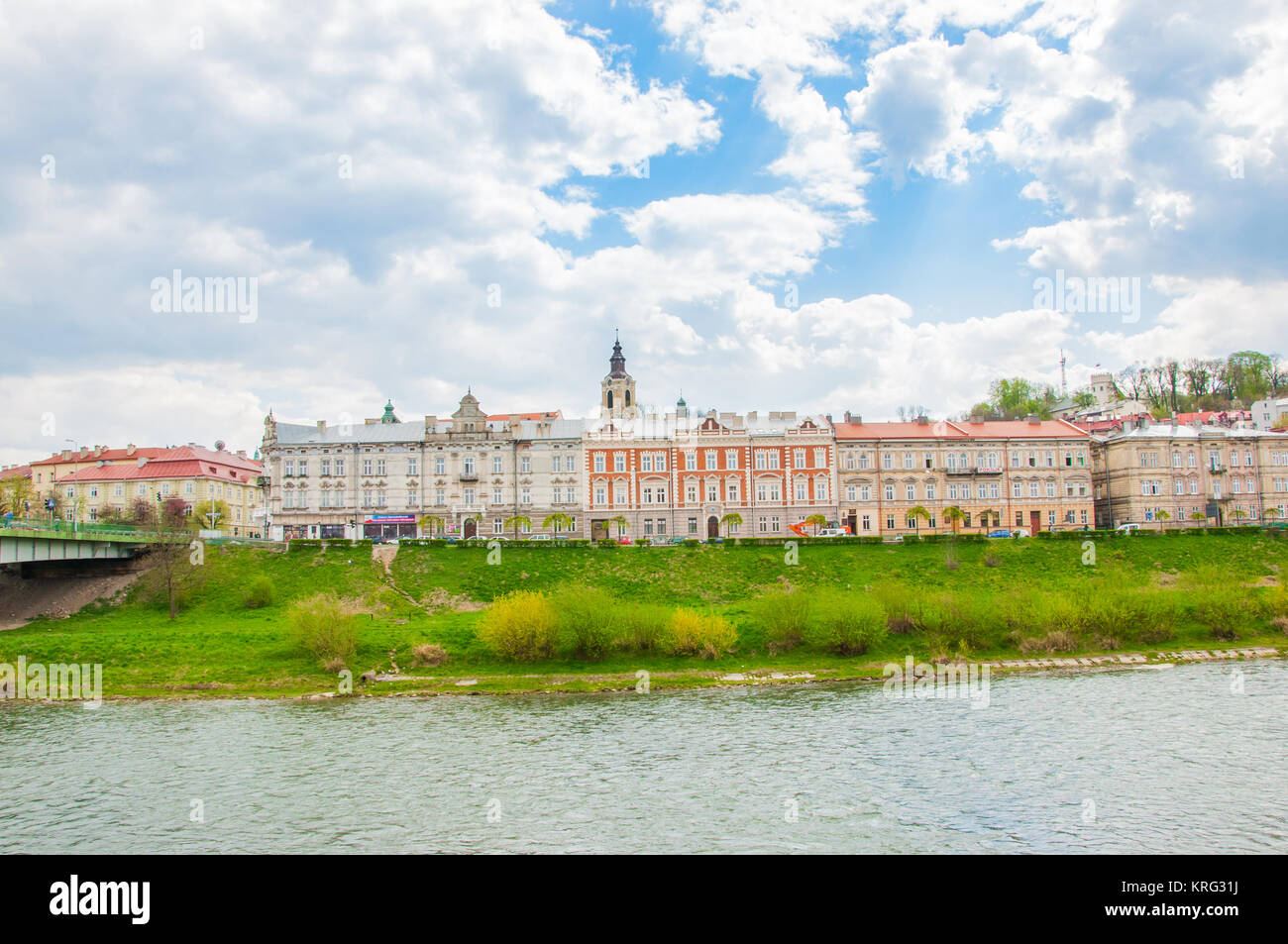Spectacular view of the ancient city near the small river with blue sky ...