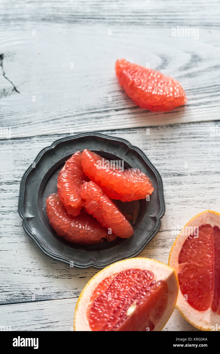 Peeled grapefruit on the table Stock Photo - Alamy