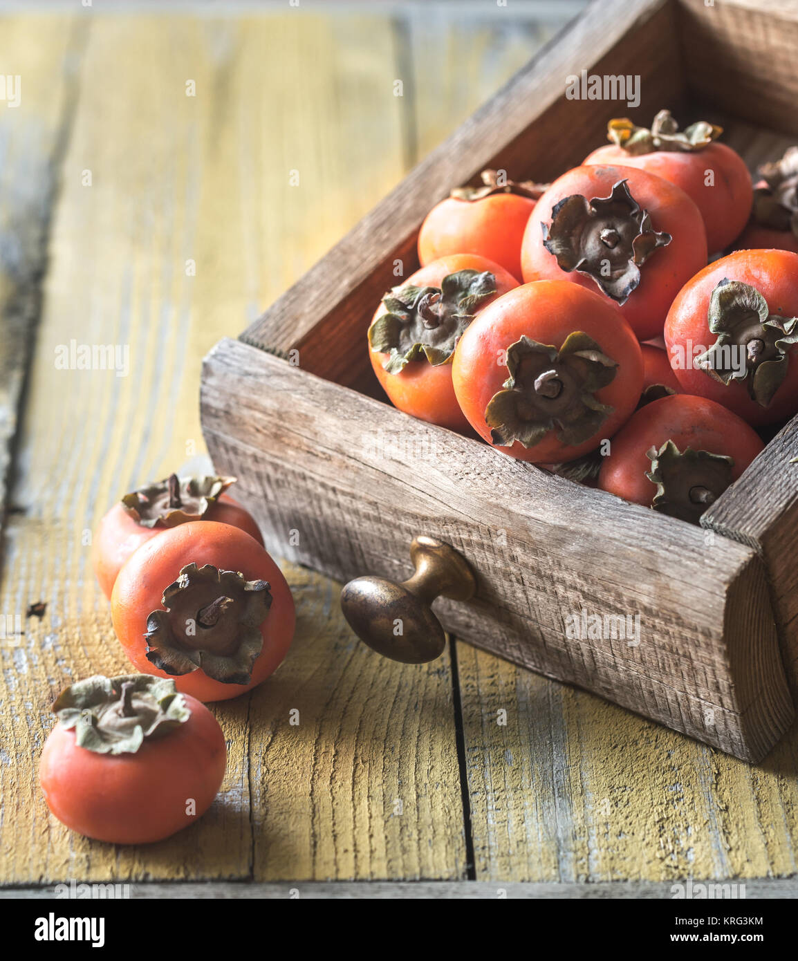 Box of persimmons hi-res stock photography and images - Alamy