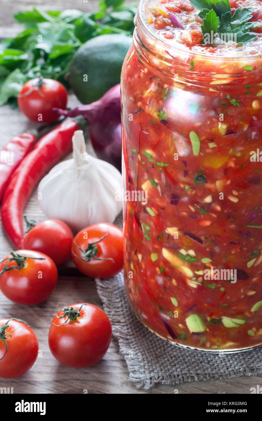 Jar of salsa with ingredients Stock Photo - Alamy
