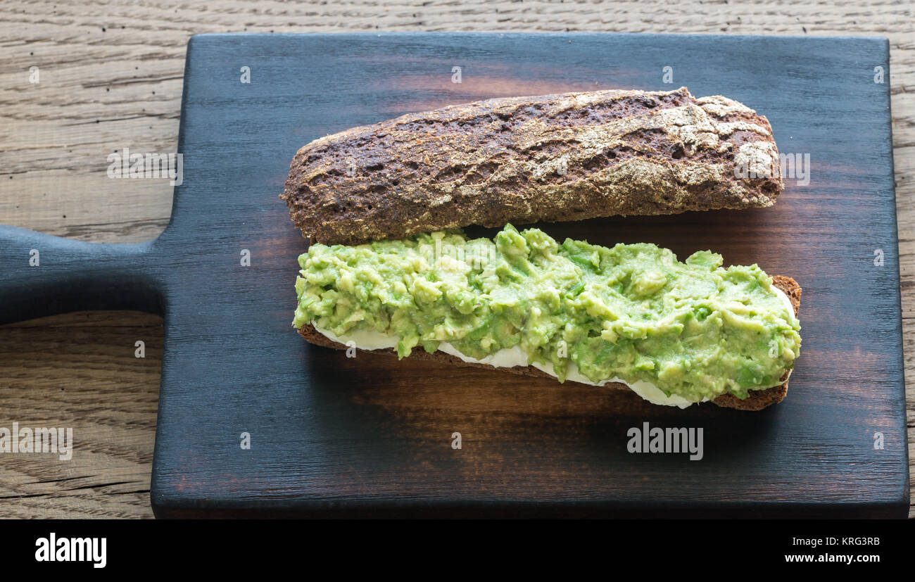 Sandwich with smashed avocado Stock Photo - Alamy