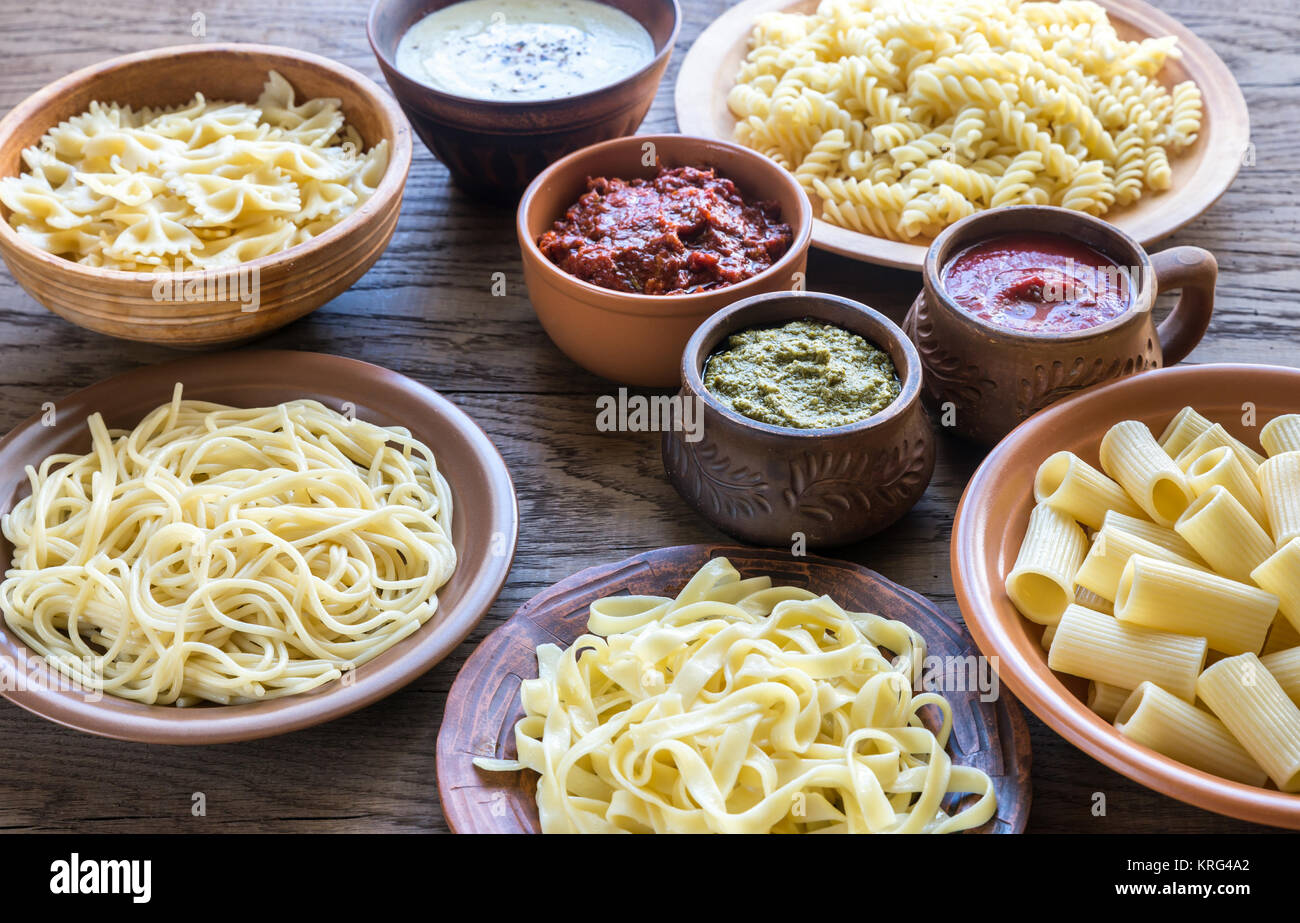 Pasta with different kinds of sauce Stock Photo - Alamy