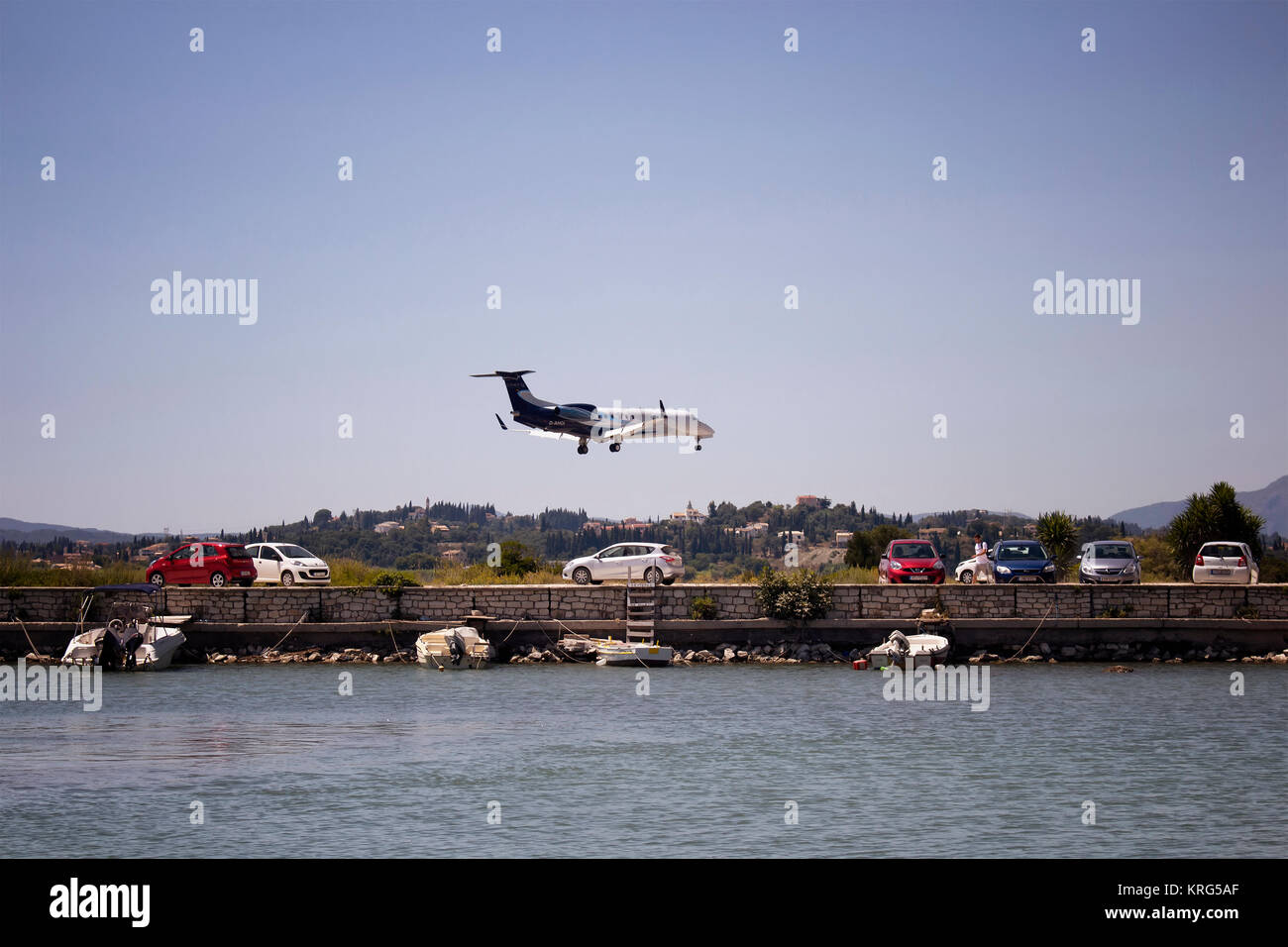View of Small private jet (airplane) landing at Corfu (Kerkyra) airport ...